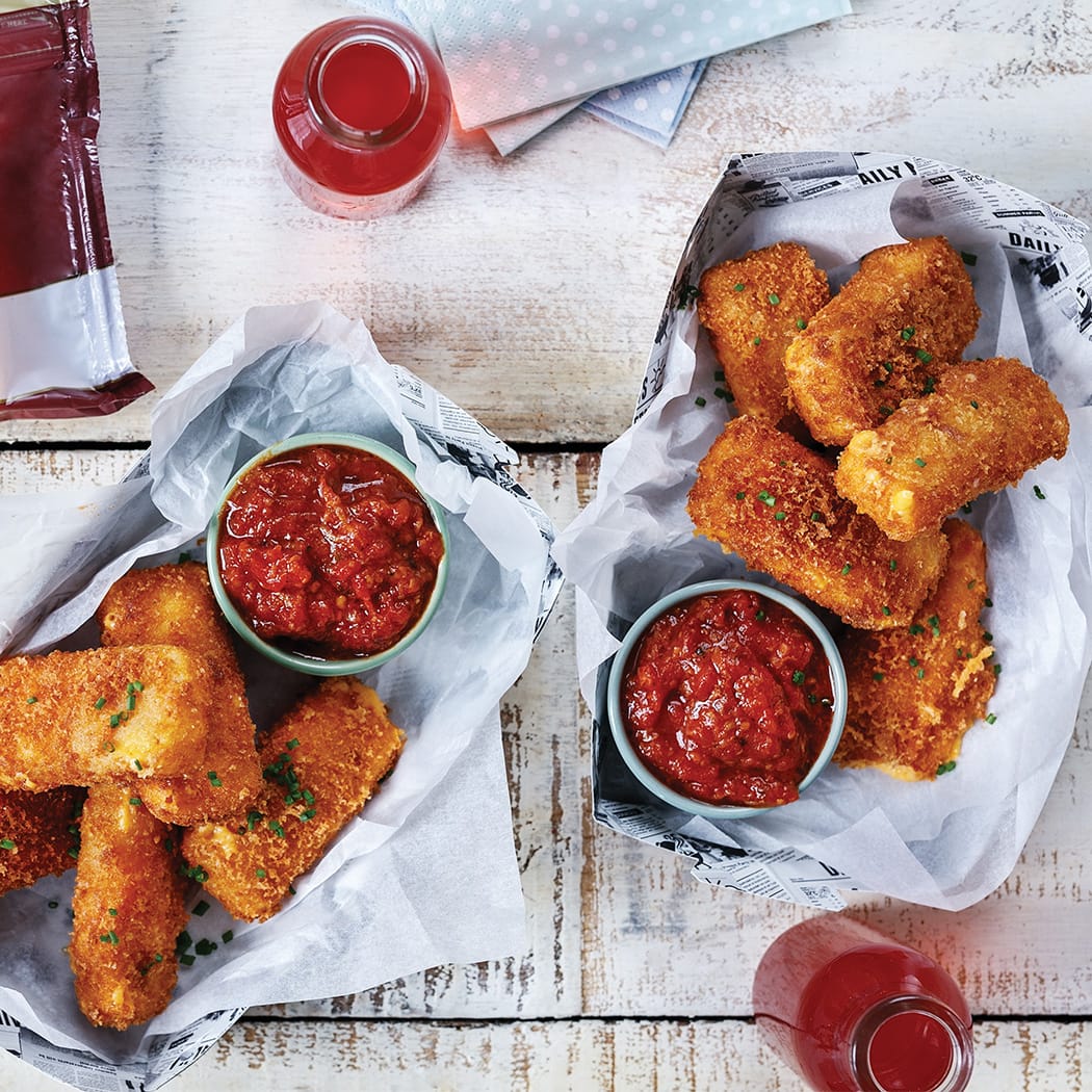 Breaded fried Cheddar sticks with spicy tomato dip | easyFood