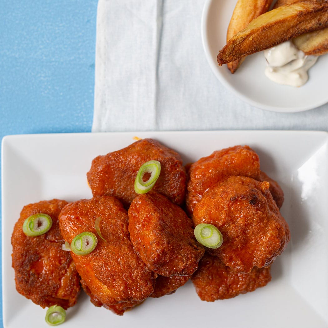 Buffalo hake goujons with garlic dip recipe | easyFood